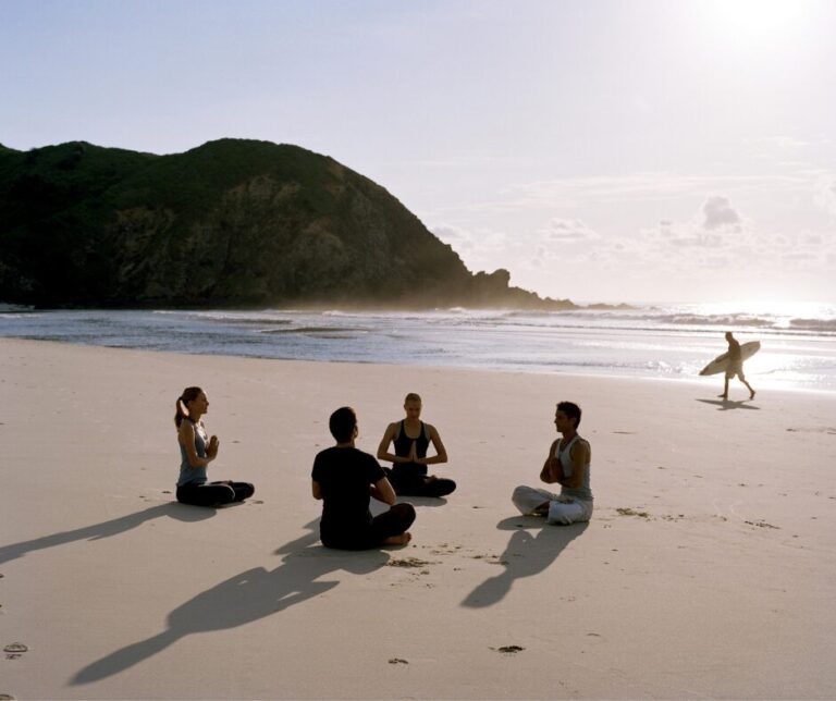 Embracing the Waves: The Ultimate Guide to Beach Yoga - BookRetreats.com